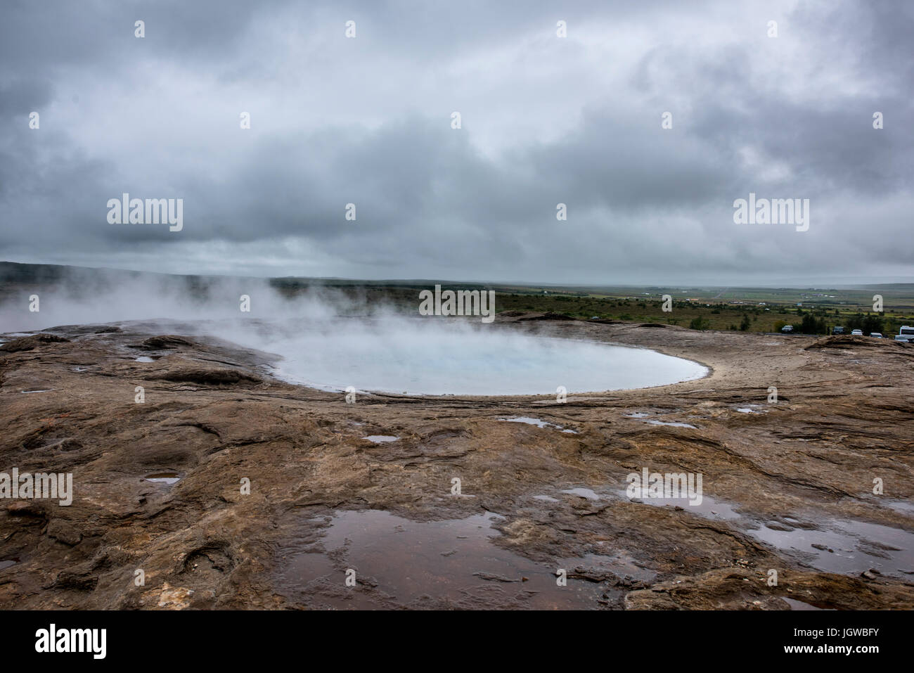Natural Hot Springs geyser in Iceland with Steam Stock Photo - Alamy