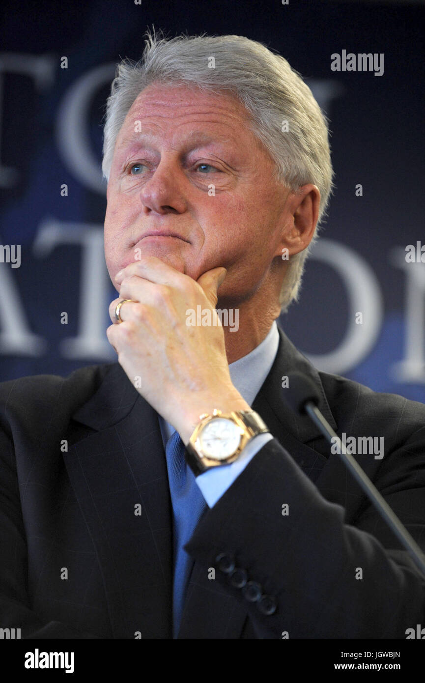 Former U.S. president Bill Clinton holds a press conference about a ...