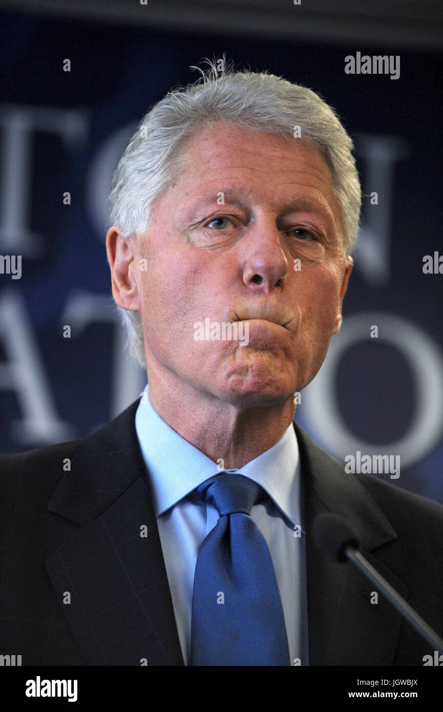 Former U.S. president Bill Clinton holds a press conference about a ...