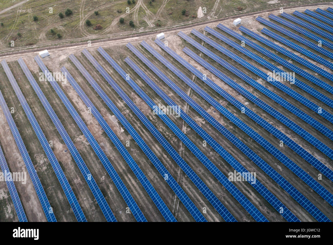 Solar panels placed on a countryside meadow Stock Photo - Alamy