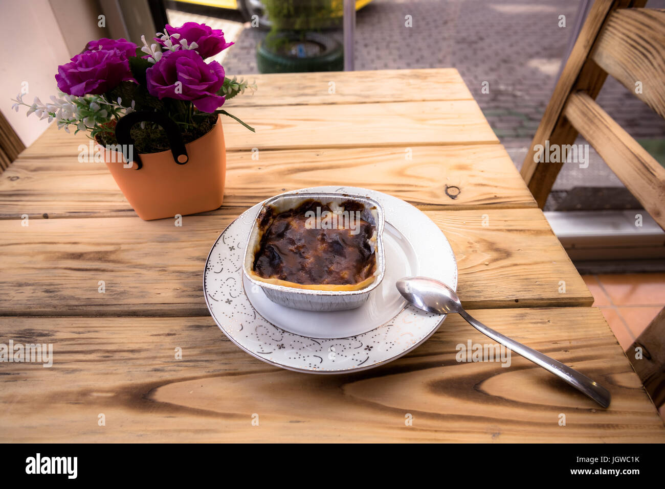 Turkish traditional rice,milk puddings(sutlac) served on a vintage ...