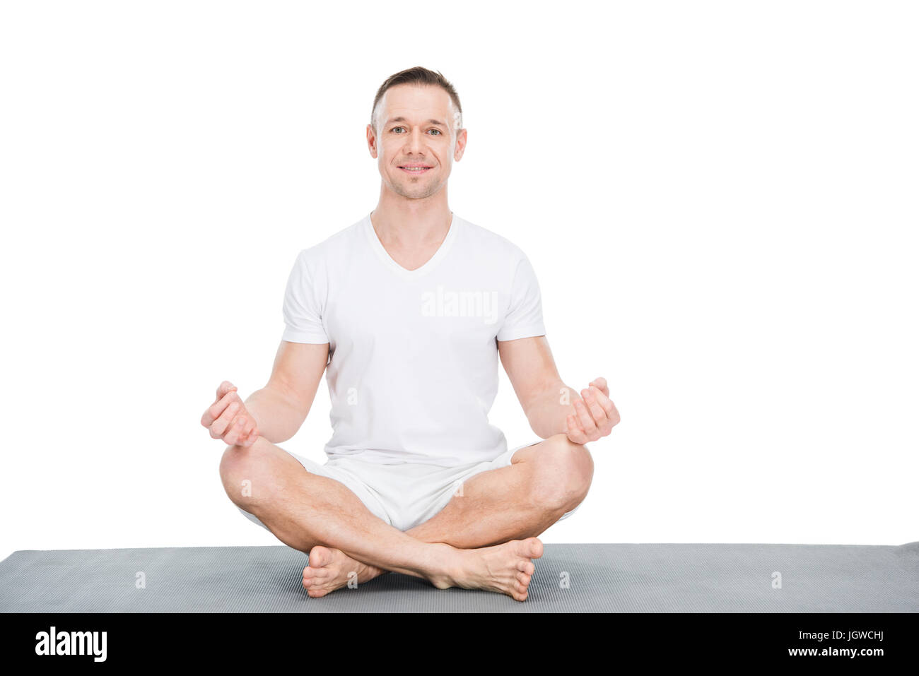 Man sitting in lotus position hi-res stock photography and images - Alamy
