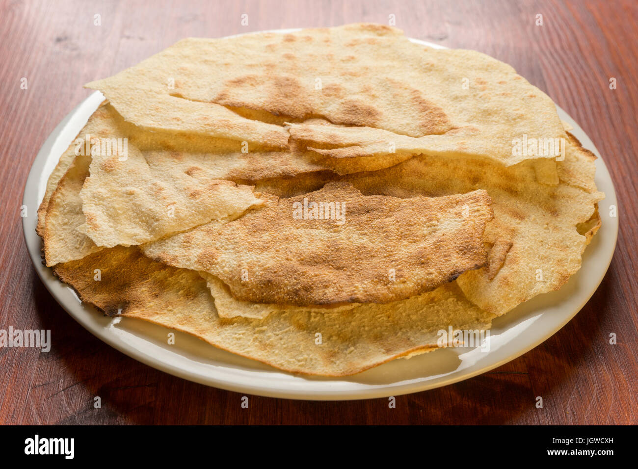 Experience the traditional pane carasau, a cornerstone of Sardinian ...