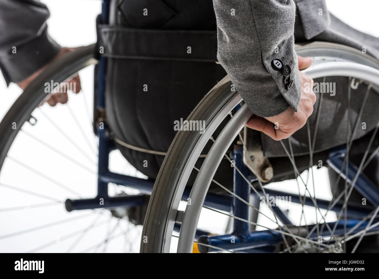 cropped shot of physically handicapped man on wheelchair isolated on ...