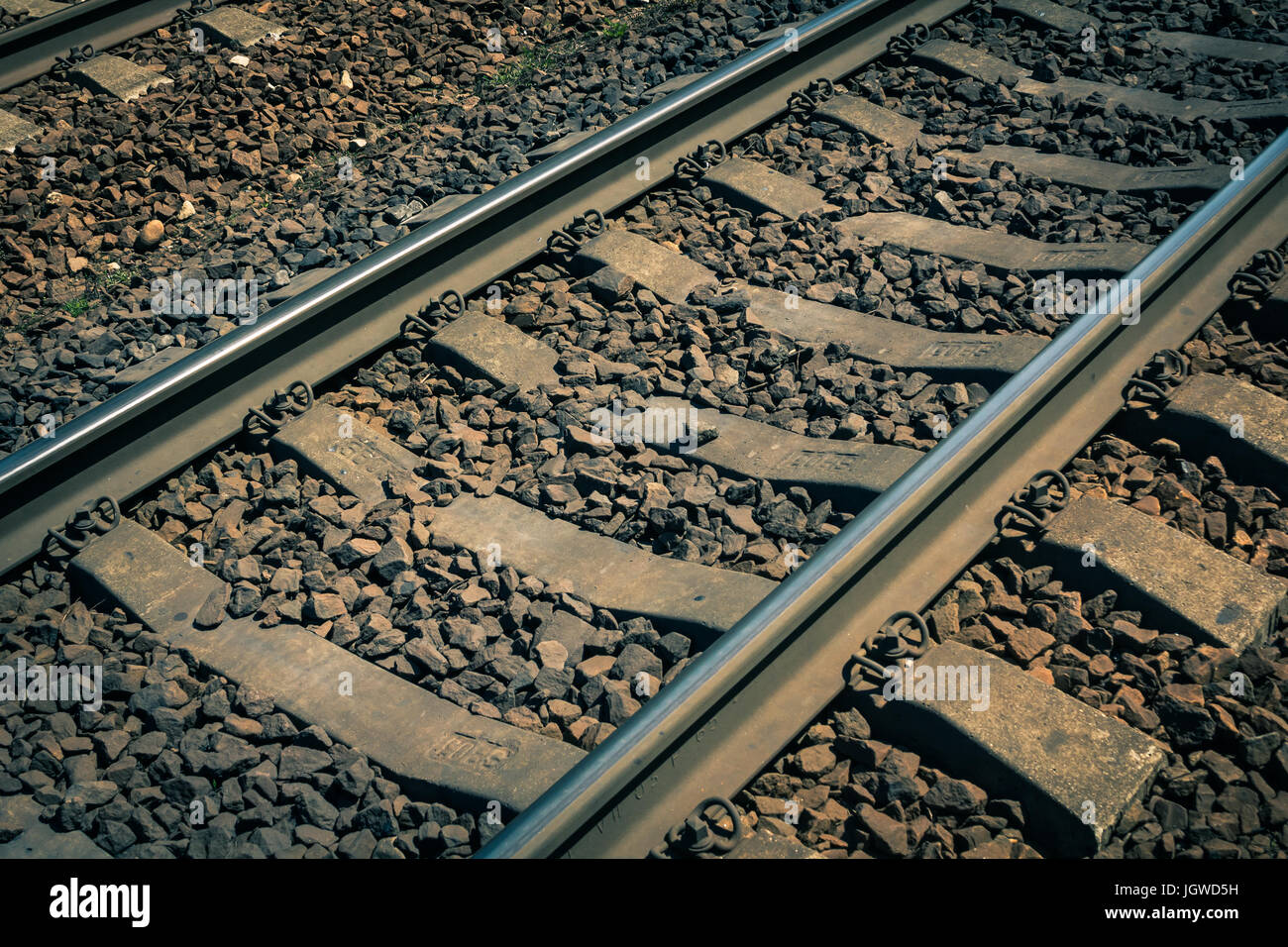 railroad tracks near an old small railroad station Stock Photo - Alamy