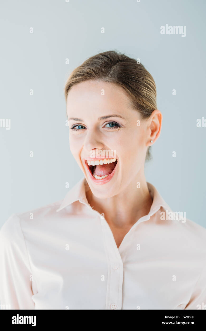 portrait of young adult caucasian businesswoman in formalwear with ...