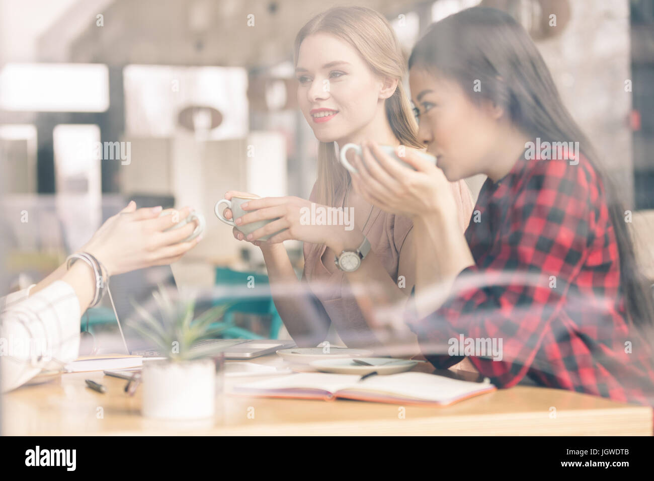 friends spend time together on coffee break in cafe Stock Photo - Alamy