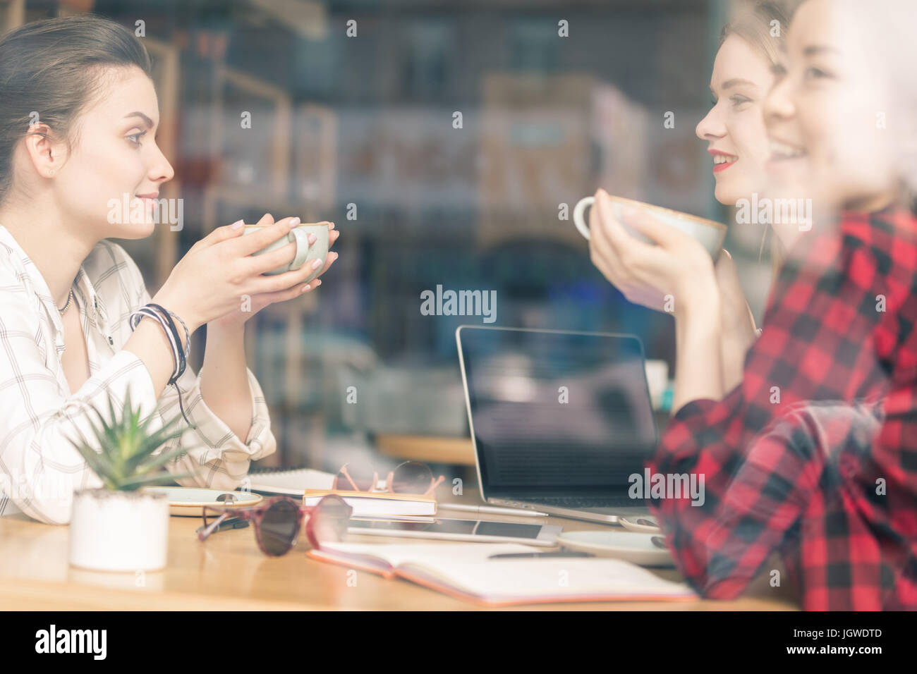 friends spend time together on coffee break in cafe Stock Photo - Alamy