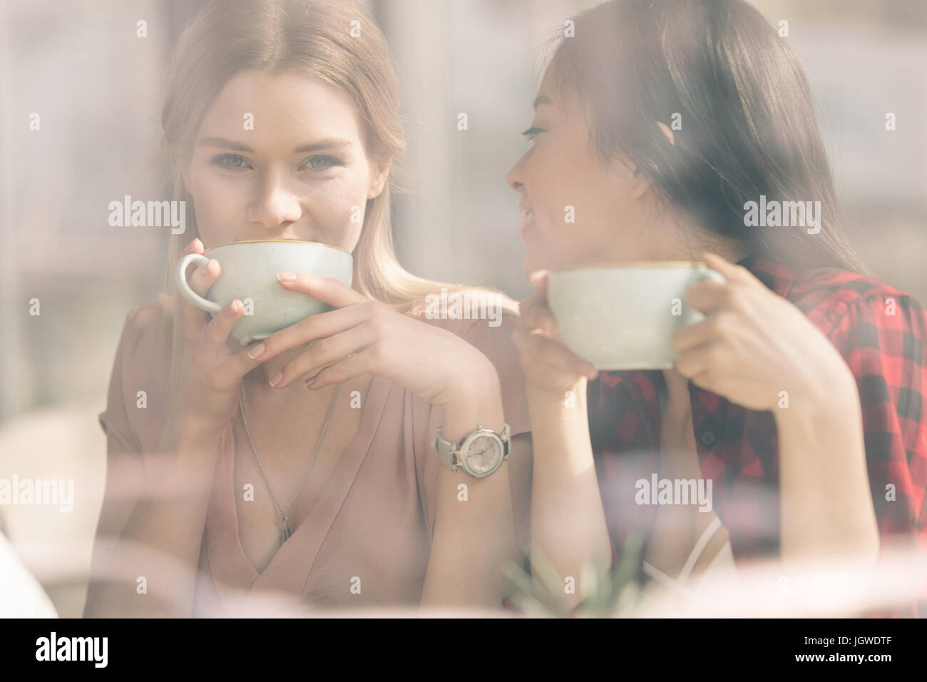 friends spend time together on coffee break in cafe Stock Photo - Alamy