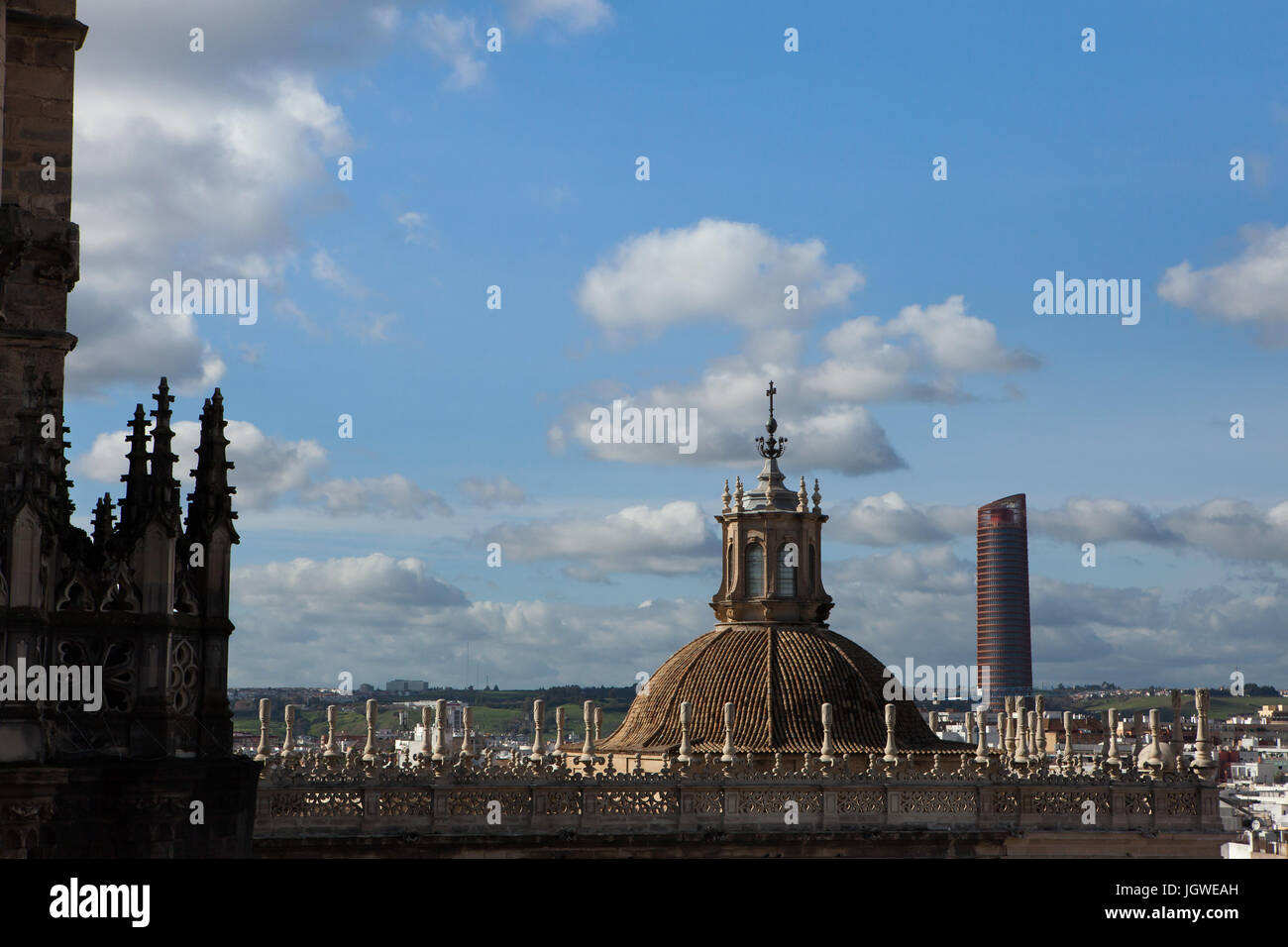 Sevilla Tower (Torre Sevilla) and the dome of the Cathedral Tabernacle ...