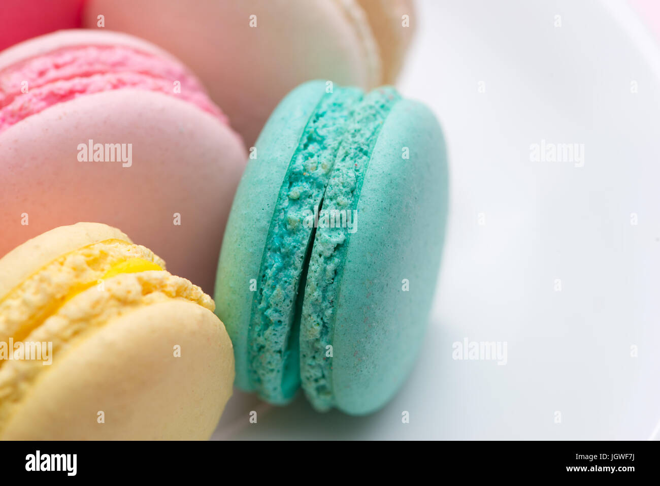 Closeup of colorful pastel macaroons. Sweet macarons Stock Photo - Alamy