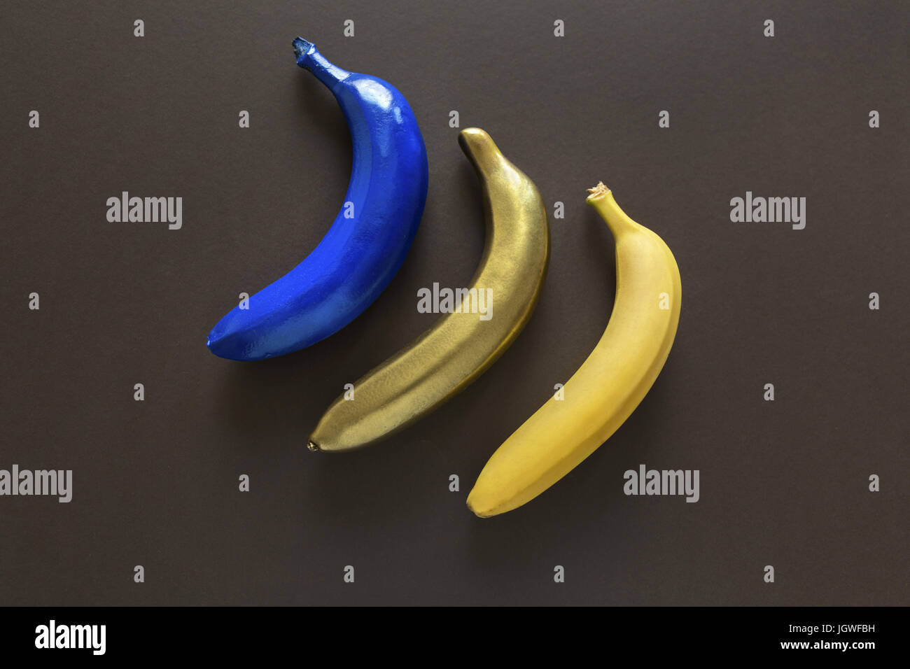 Top view of yellow, blue and golden bananas collection isolated on ...