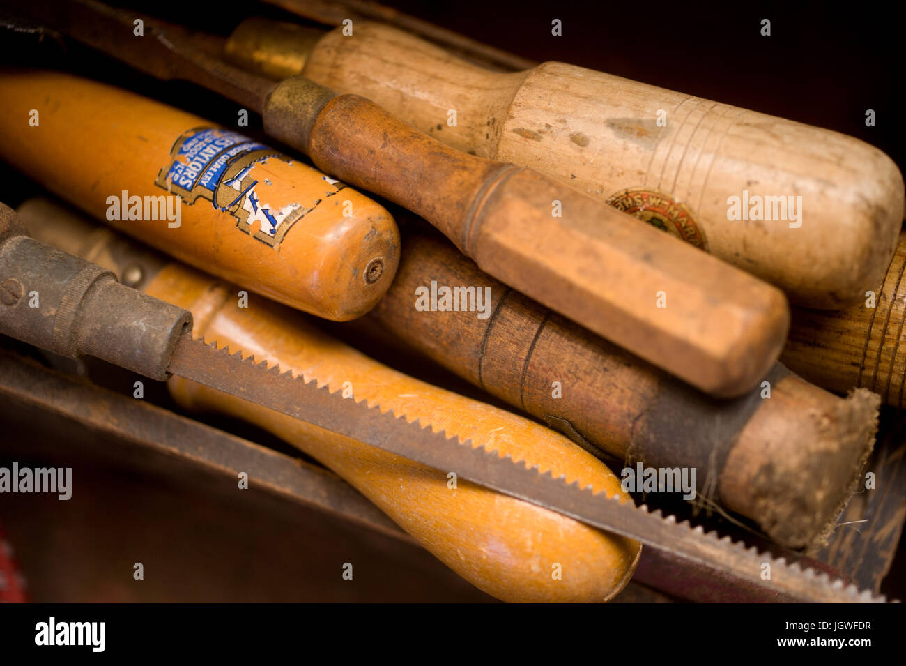 Boat building chisels and saw Stock Photo - Alamy