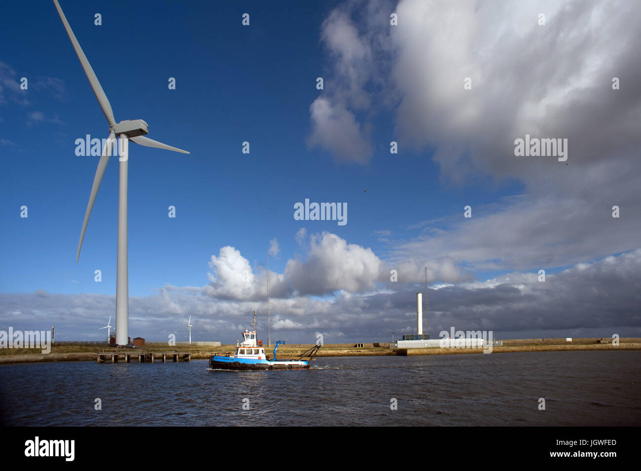 Blyth Endeavour tug boat passing wind turbine, Blyth Harbour ...