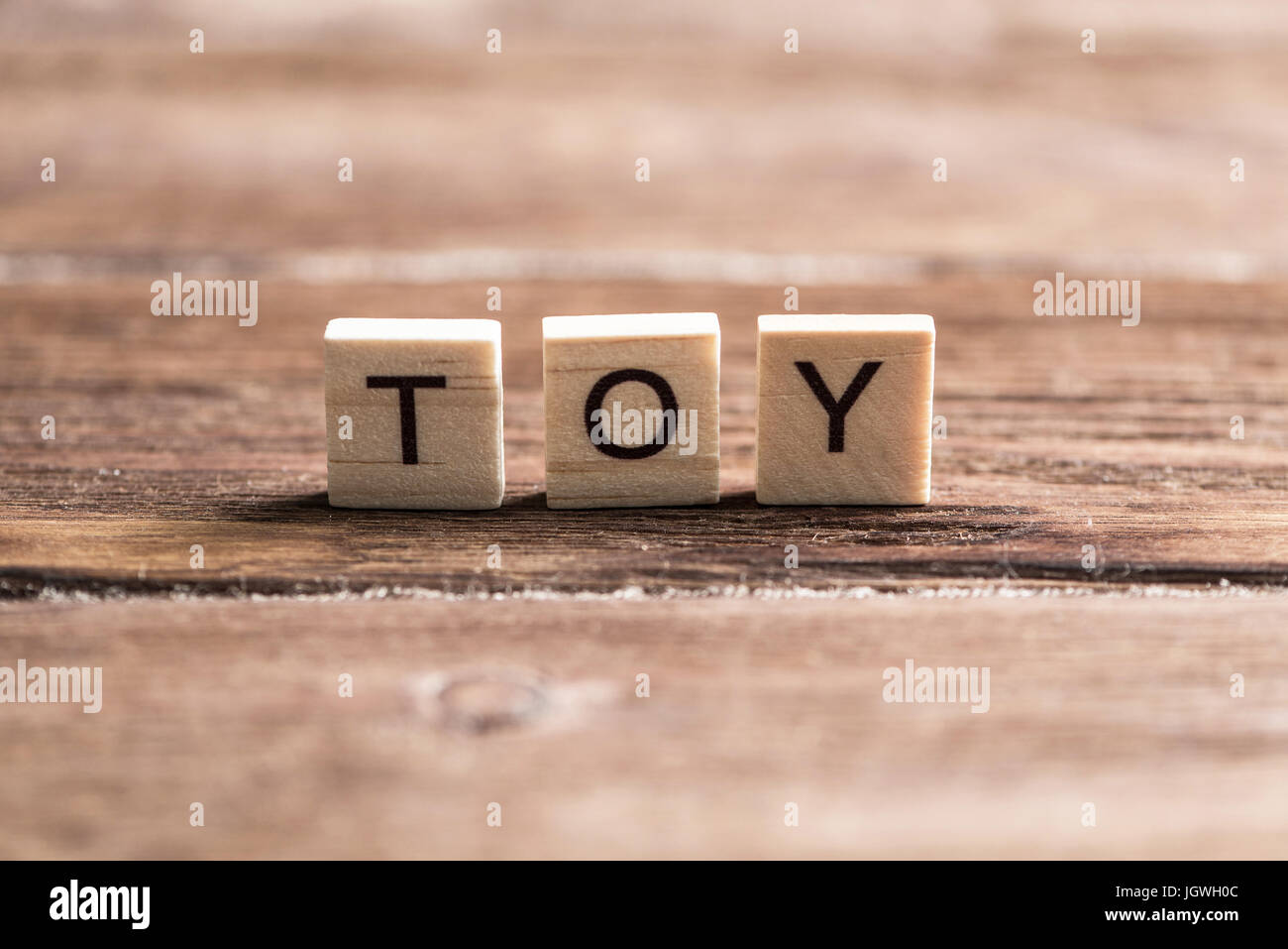 word of wooden elements with letters Stock Photo - Alamy