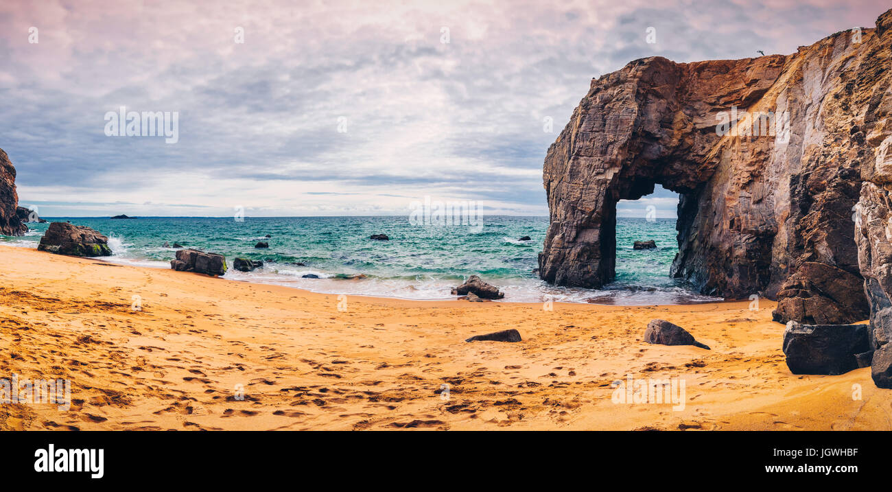 Spectacular natural cliffs and stone arch Arche de Port Blanc and ...
