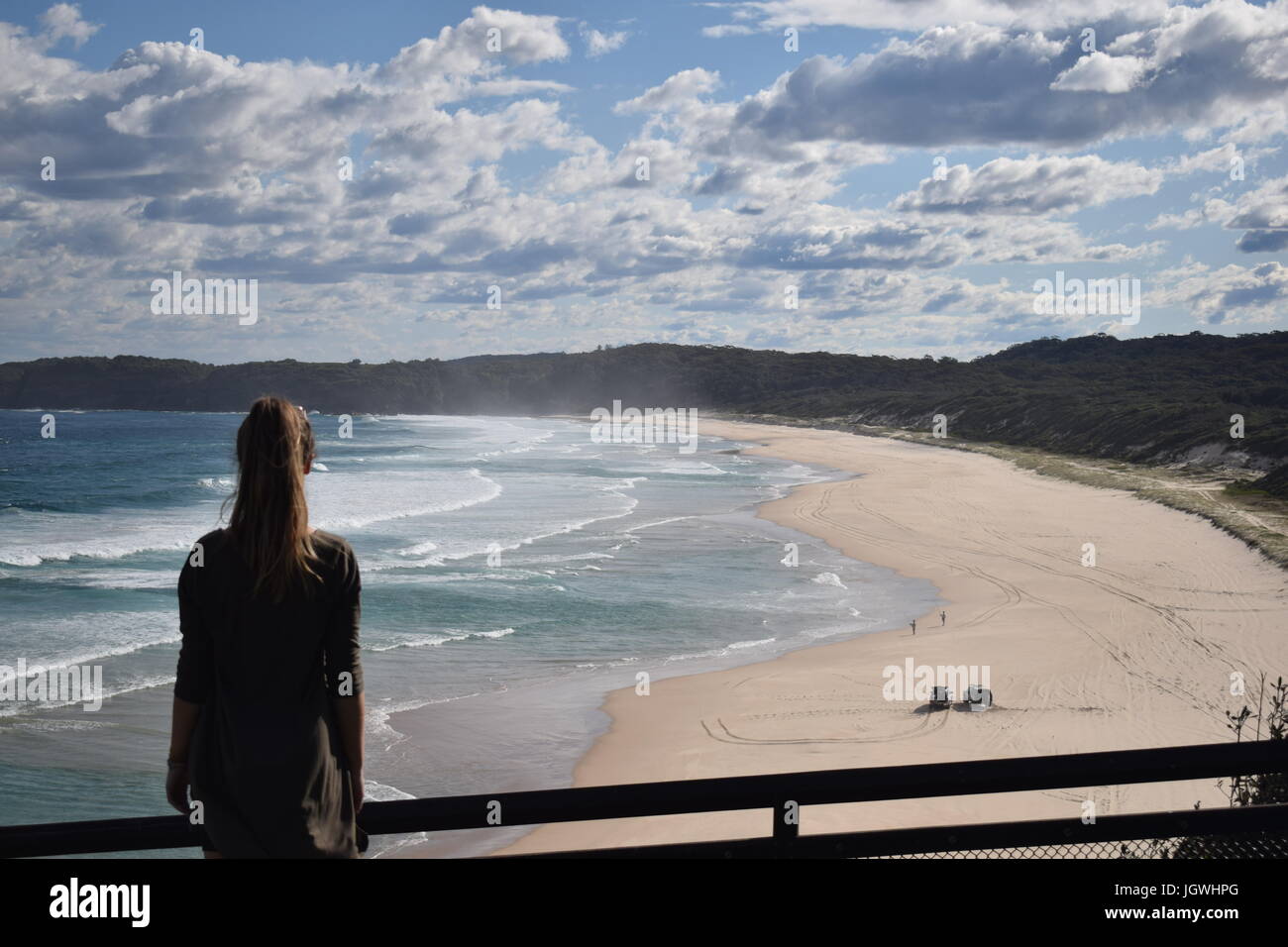 Woman, ocean, rail hi-res stock photography and images - Alamy