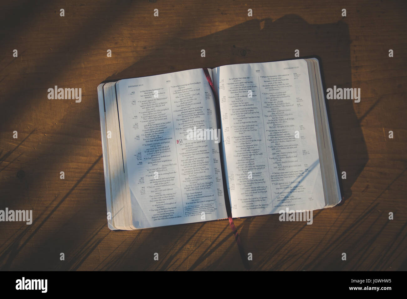 A bible laying open in the grass Stock Photo - Alamy