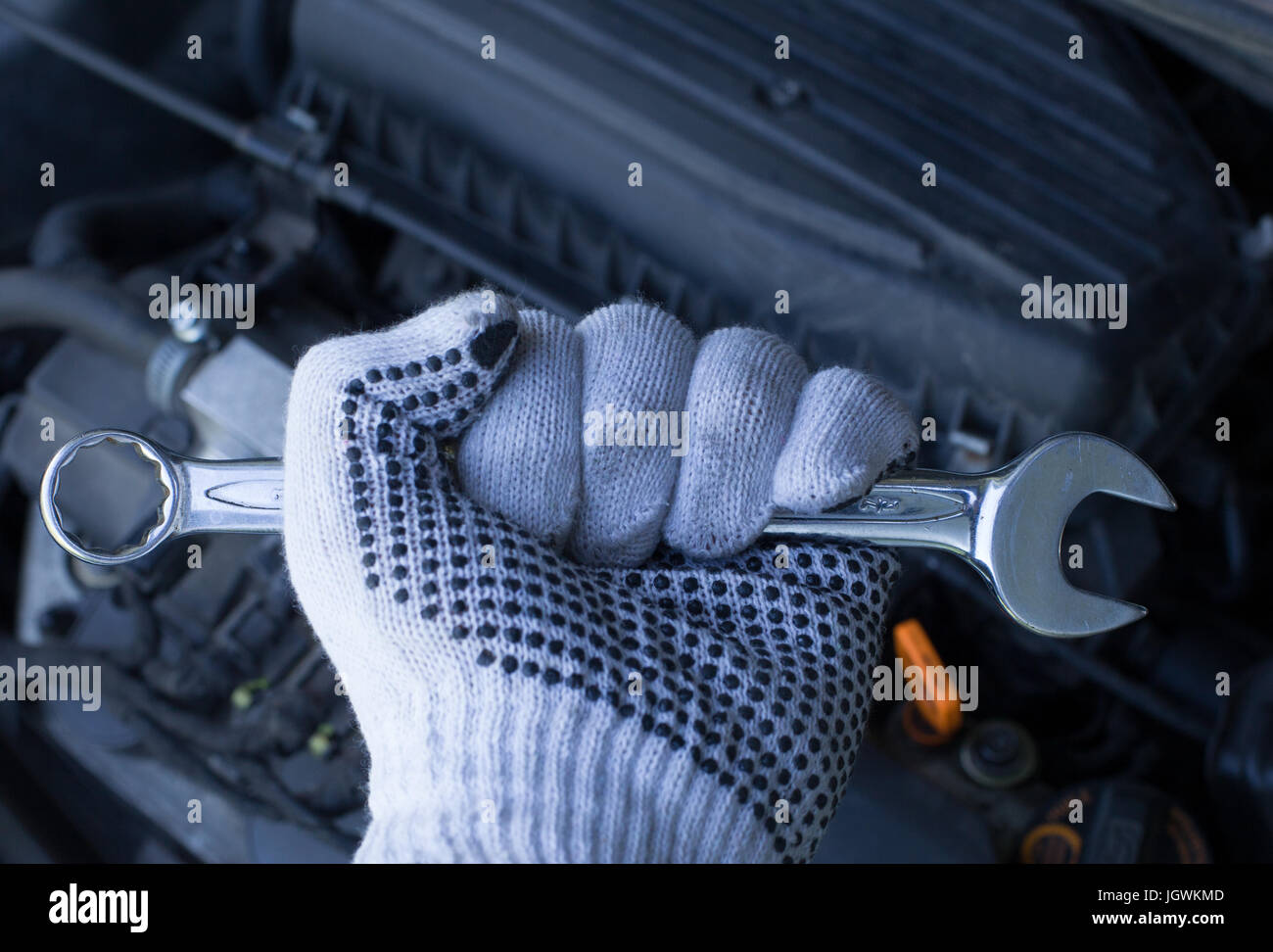Mechanic at work > Fixing automotive engine - tools key Stock Photo - Alamy