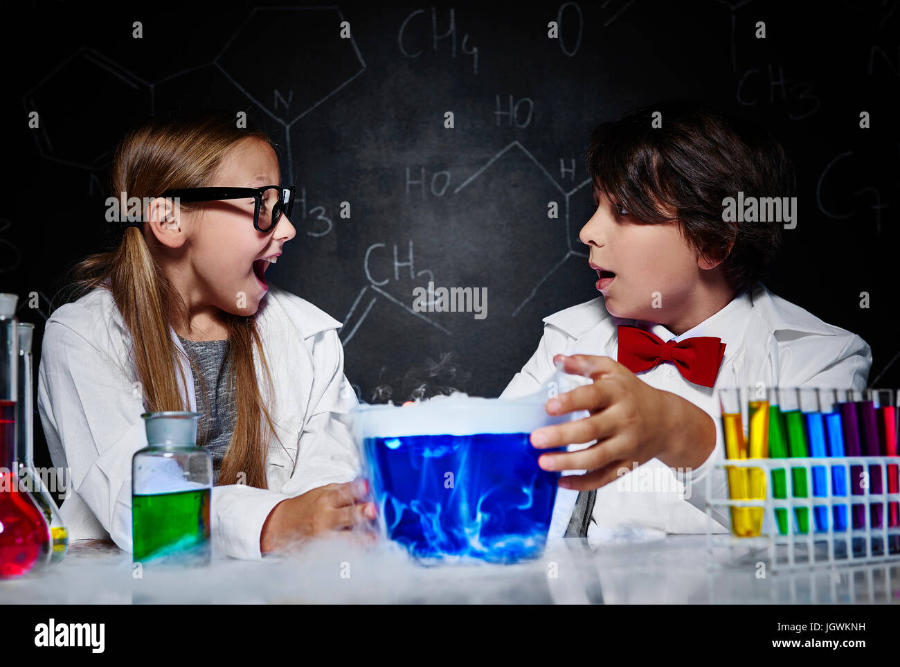 Happy small scientist at the chemistry class Stock Photo - Alamy