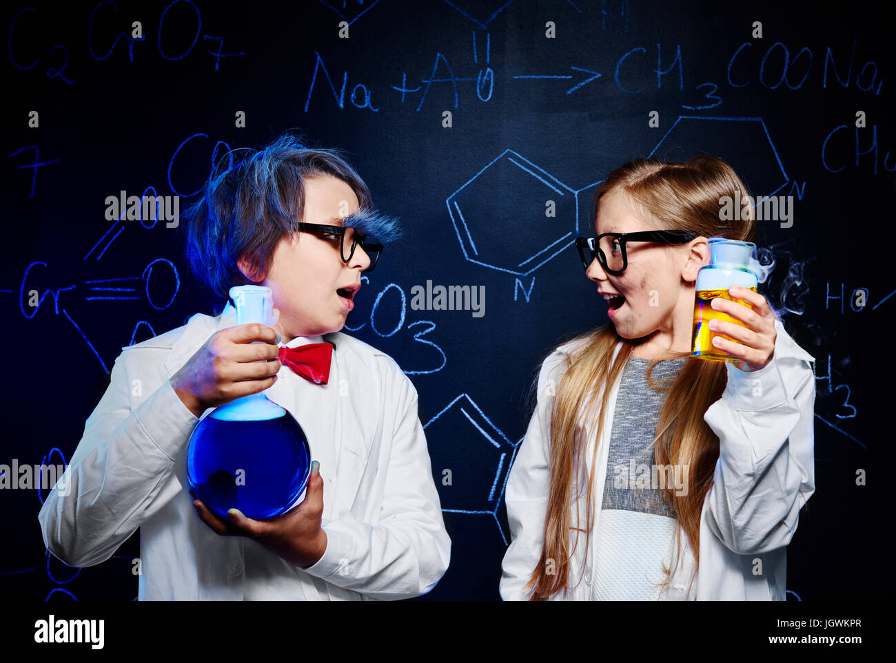 Crazy scientists with magic liquid Stock Photo - Alamy
