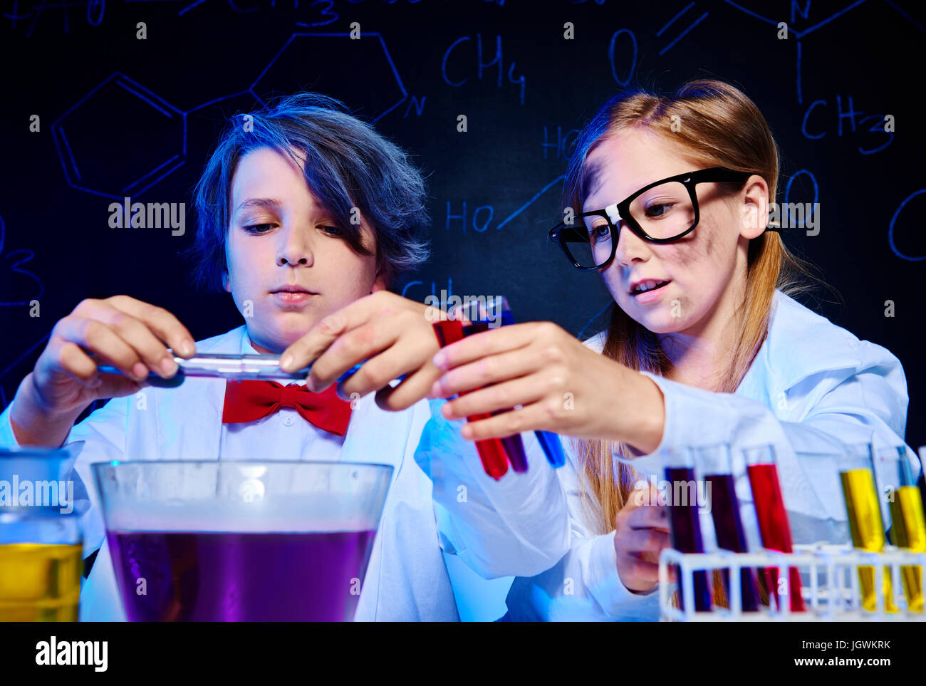 Small scientists working in laboratory Stock Photo - Alamy