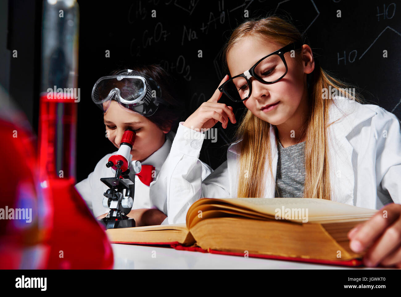 Two little scientists in laboratory Stock Photo - Alamy