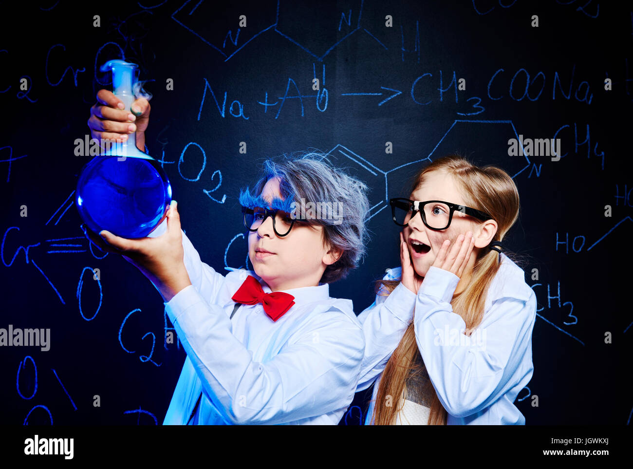 Small scientists make something together Stock Photo - Alamy