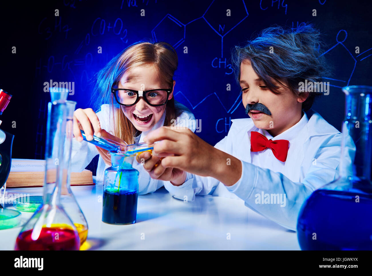 Crazy little scientists in laboratory Stock Photo - Alamy