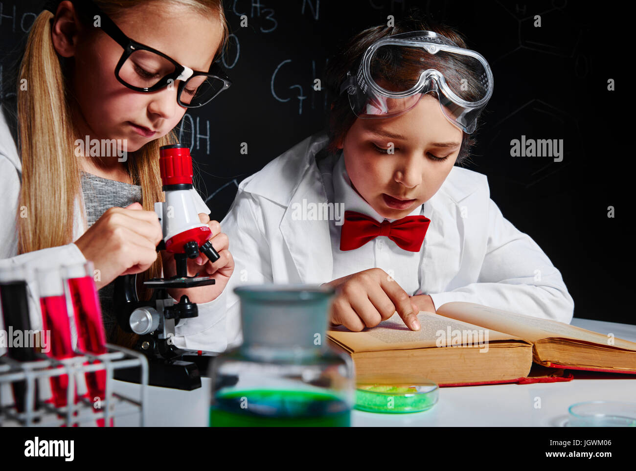 Working kids in laboratory Stock Photo - Alamy