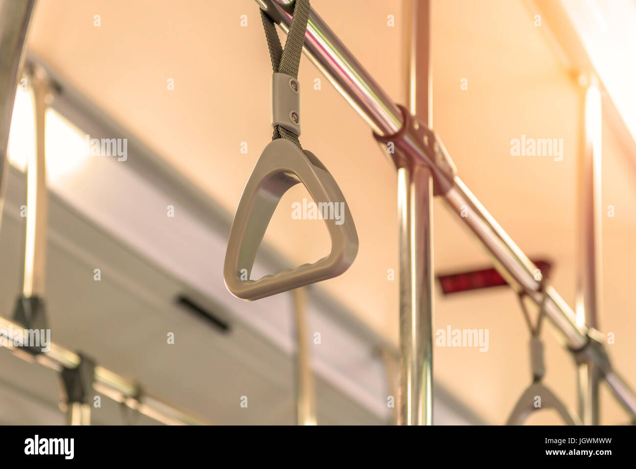 Handles standing passenger inside bus transportation hi-res stock ...