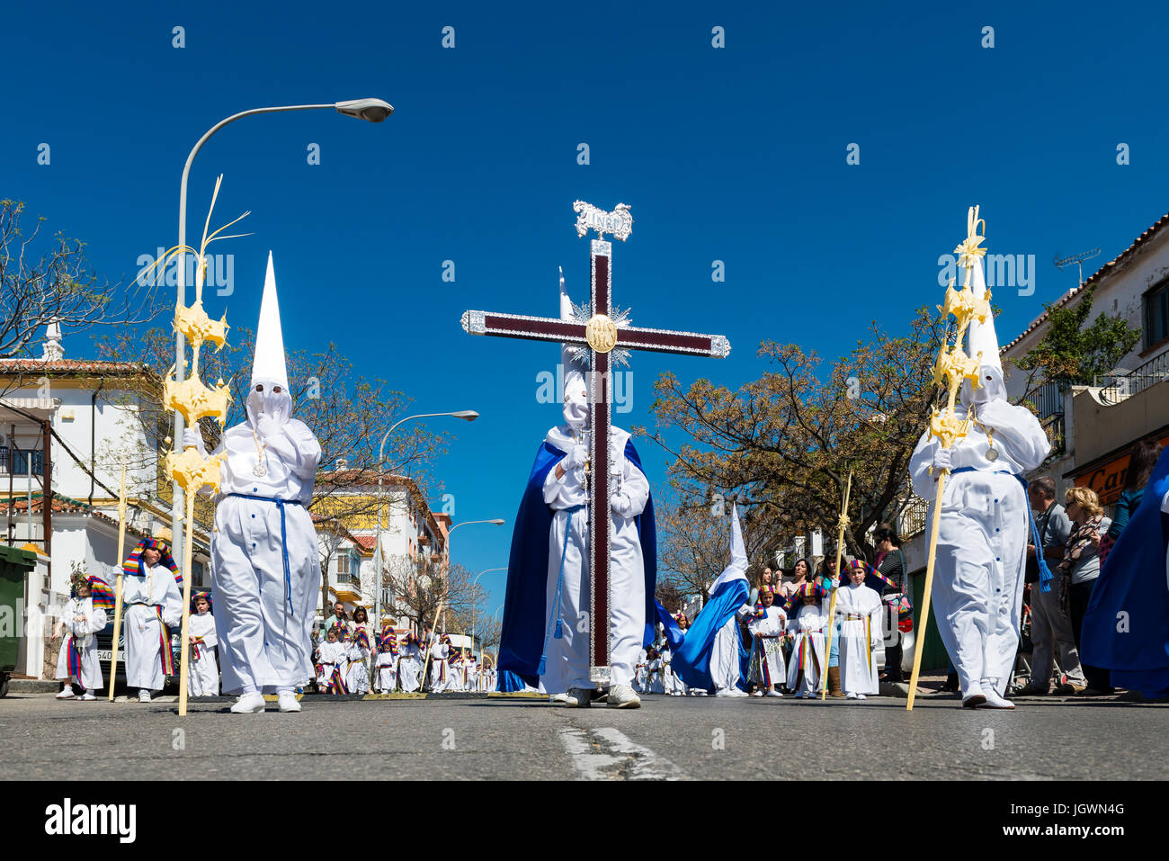 Penitents, Nazarenos, in their typical hooded robes during the ...