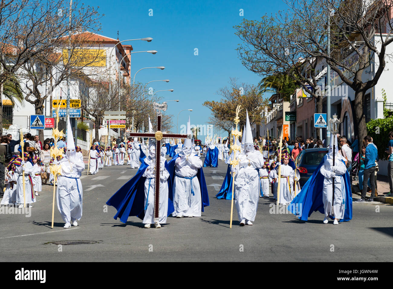 Penitents, Nazarenos, in their typical hooded robes during the ...