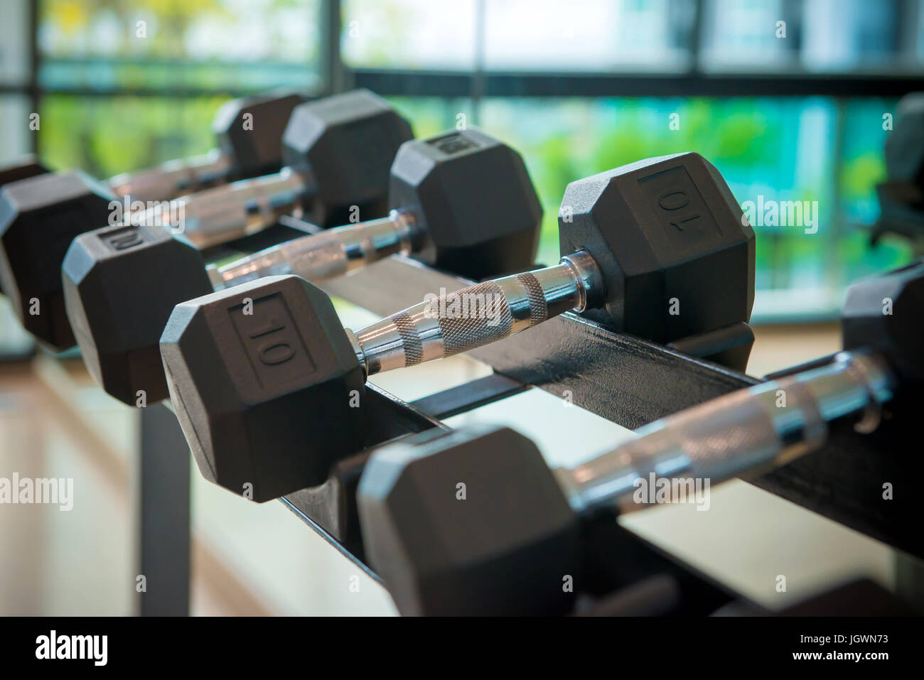 dumbbells in the gym at sports club for exercise and Bodybuilding Stock ...