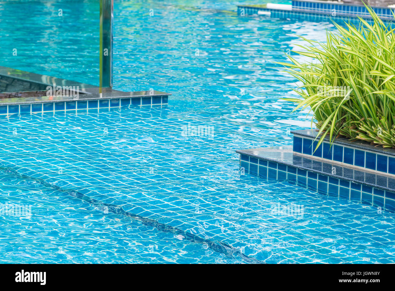 blue swimming pool at hotel, summer vacation concept Stock Photo - Alamy