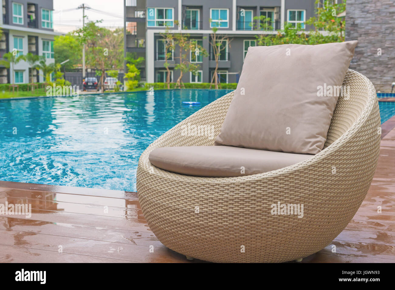pool bed near swimming pool in tropical resort Stock Photo - Alamy