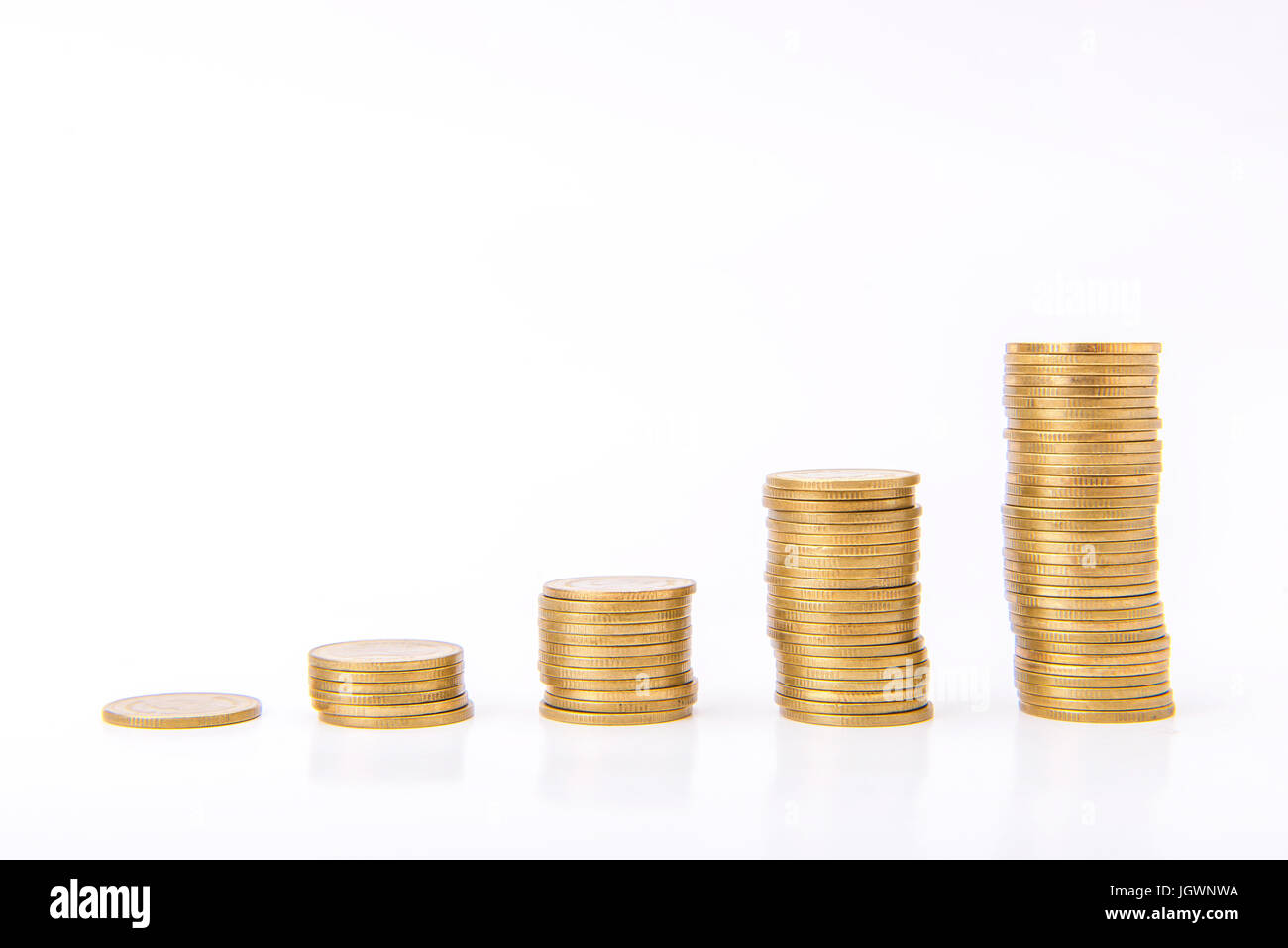 Saving money concept, coin stack growing business Stock Photo - Alamy
