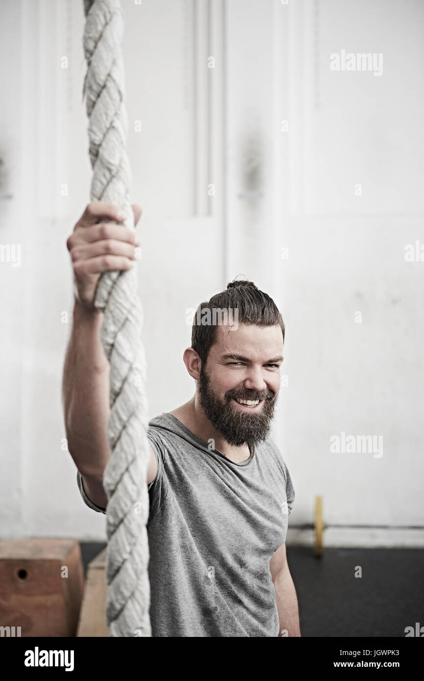 Man holding rope hi-res stock photography and images - Alamy