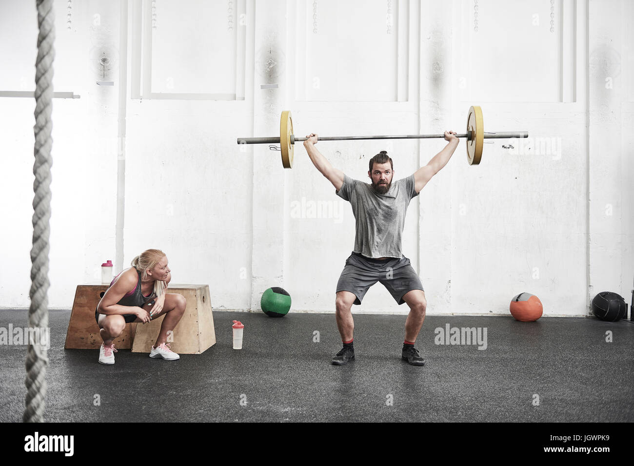 Young man woman cross arms hi-res stock photography and images - Alamy