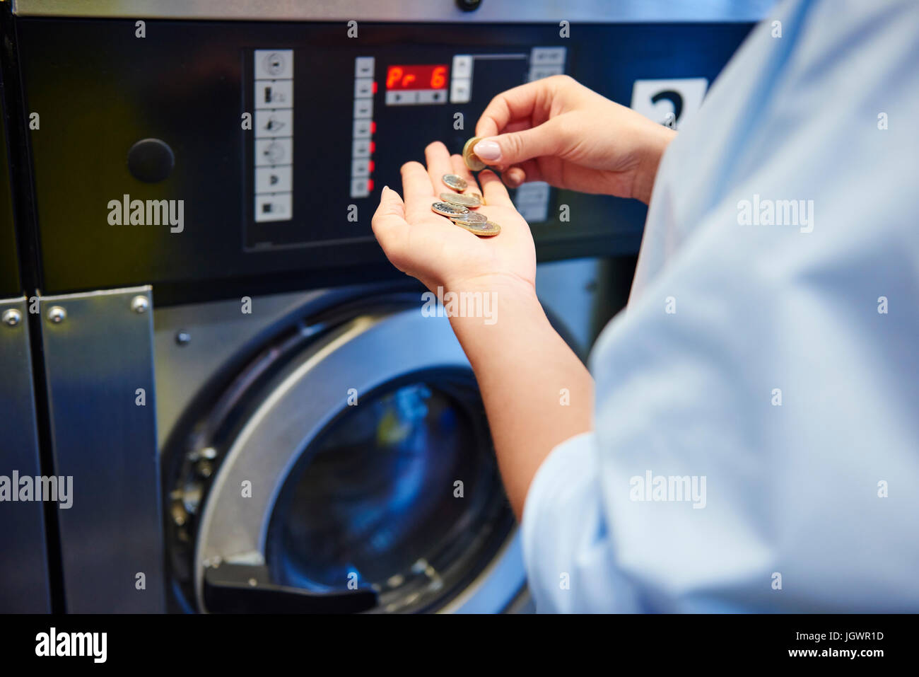 Women washing machine hi-res stock photography and images - Alamy