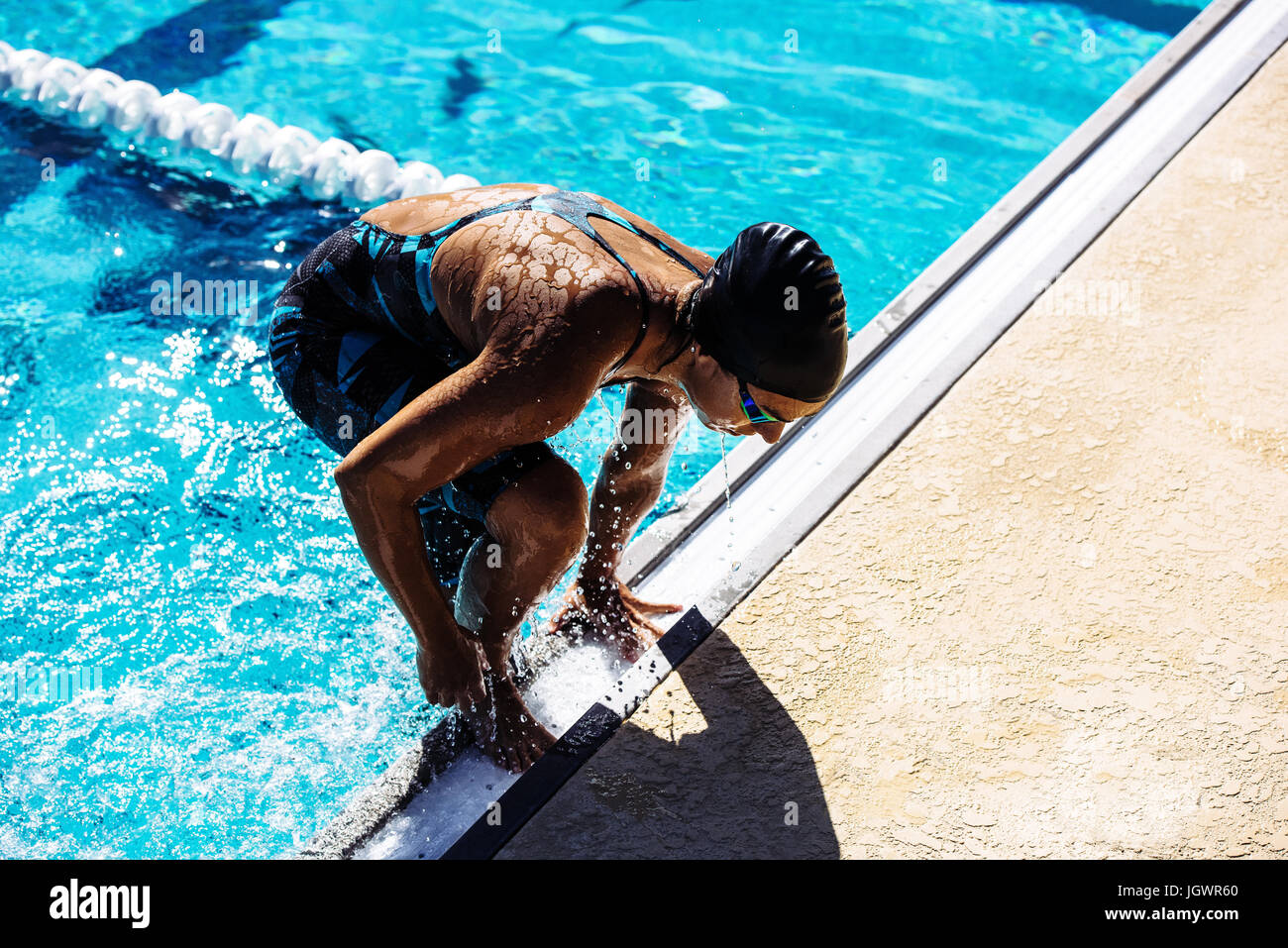 Climbing Out Of Swimming Pool High Resolution Stock Photography and ...