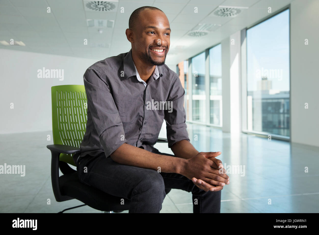 Businessman sitting chair hi-res stock photography and images - Alamy