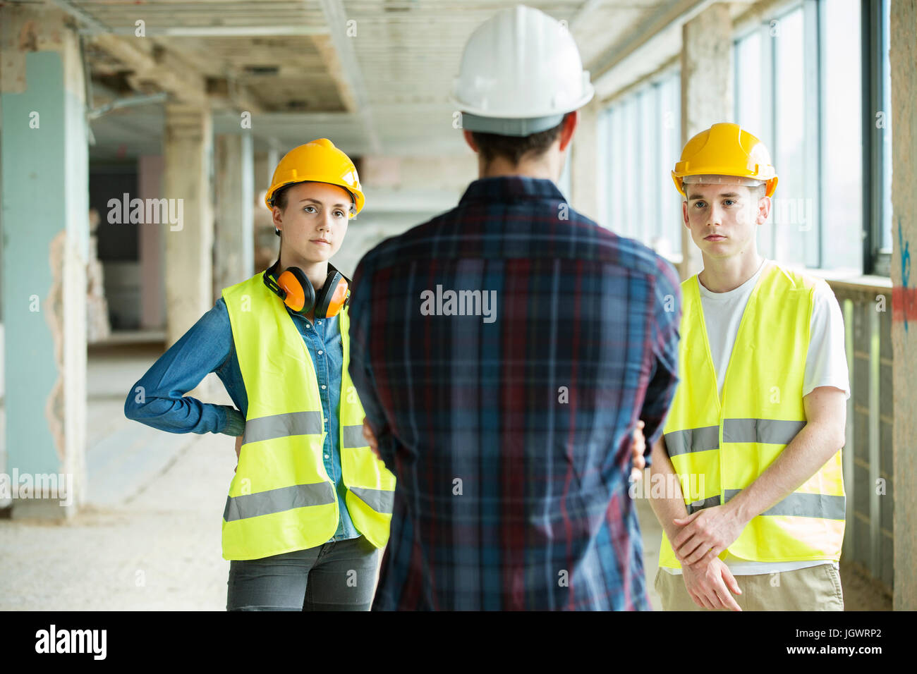 Man woman in hard hats hi-res stock photography and images - Alamy