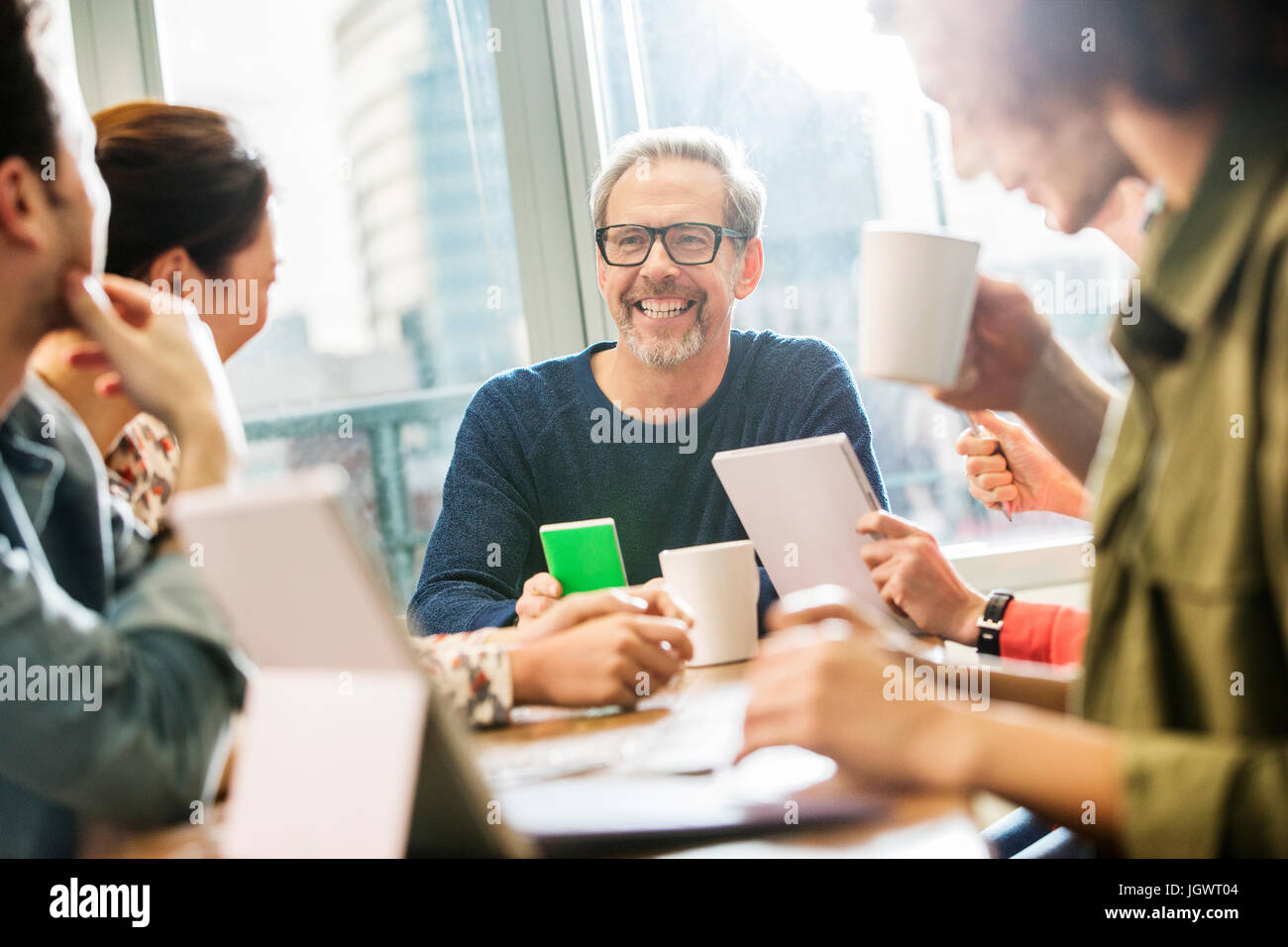 Digital design team having meeting in office Stock Photo - Alamy