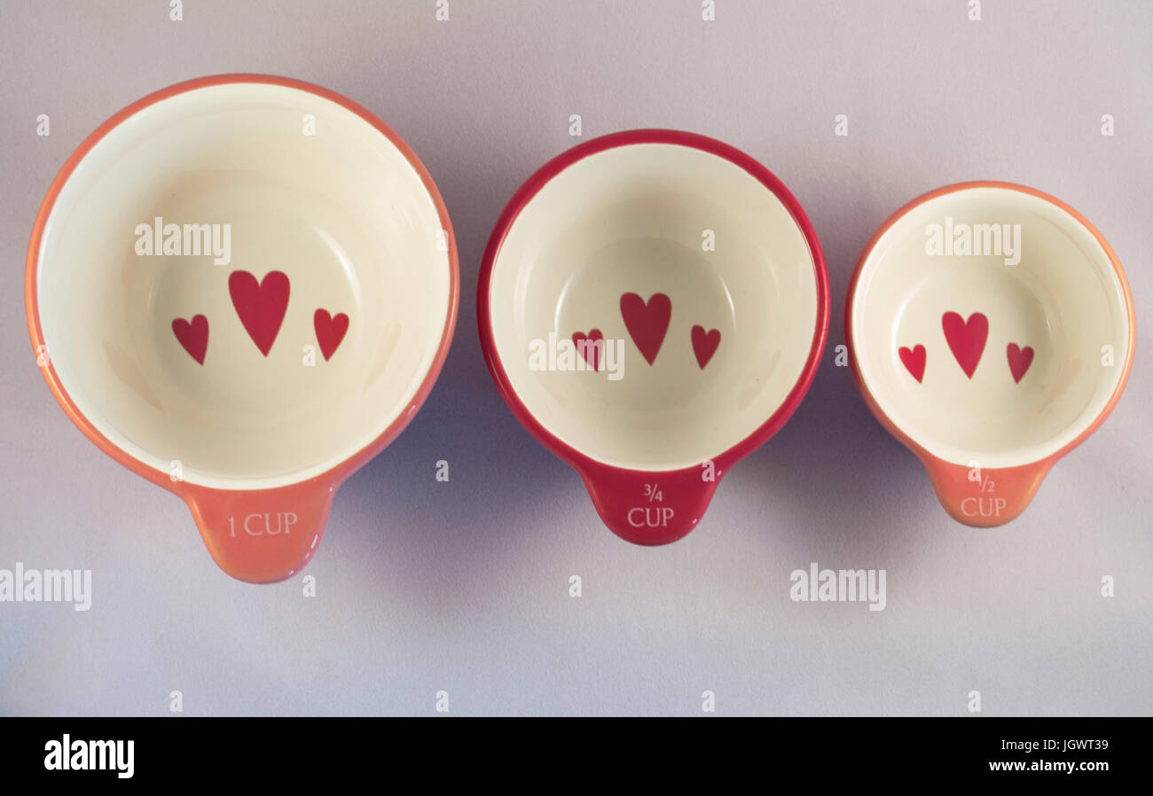 pink measuring cups Stock Photo - Alamy