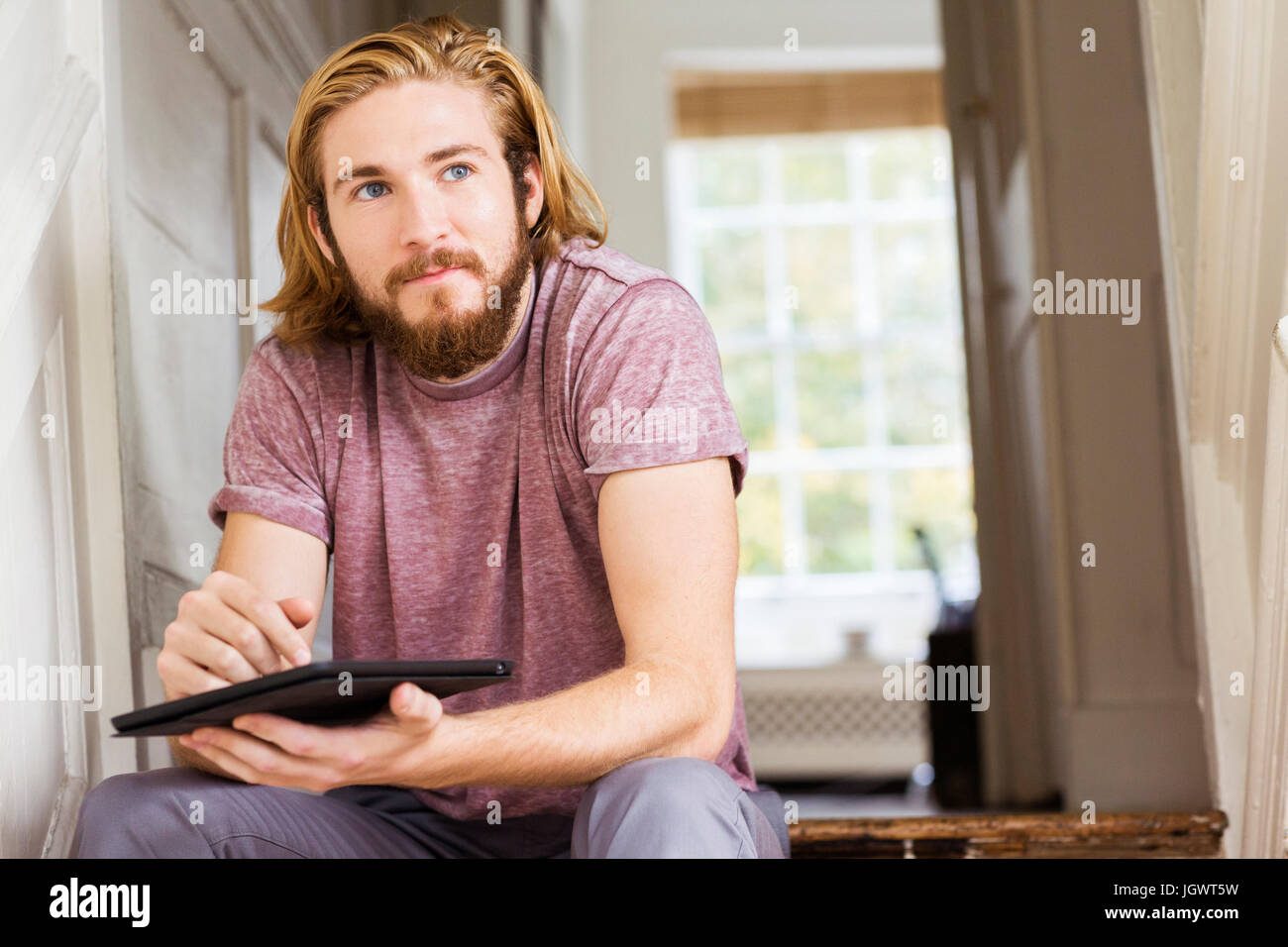 Male contemplating hi-res stock photography and images - Alamy