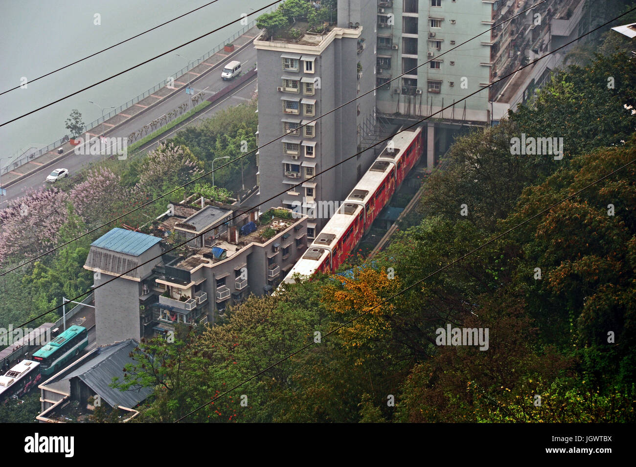 A train drives through a residential high-rise building in the Chinese ...