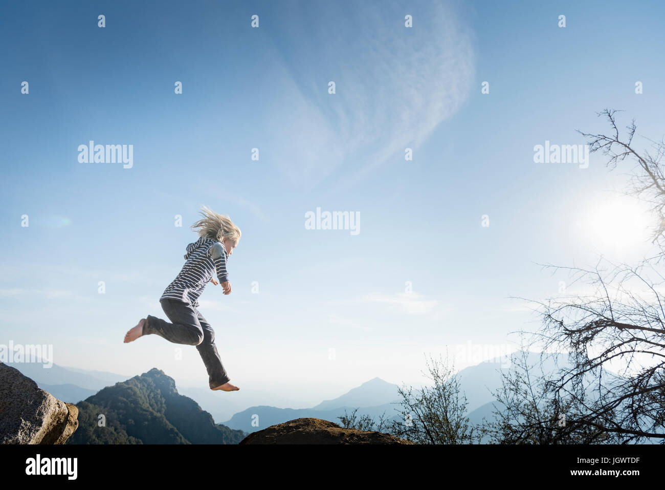 Boy jumping in well hi-res stock photography and images - Alamy