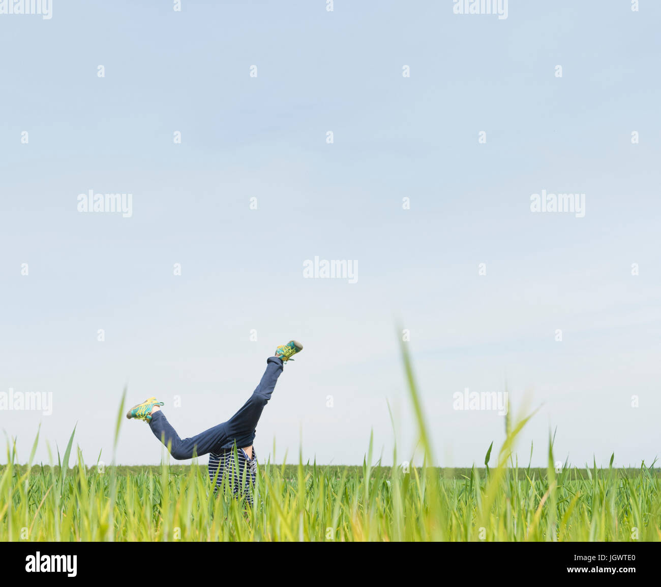 Cartwheeling boys hi-res stock photography and images - Alamy