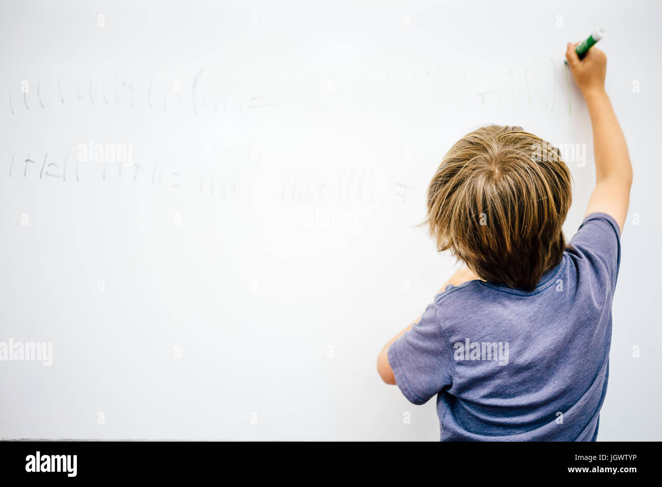 Boy writing education concept hi-res stock photography and images - Alamy